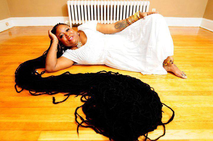 Crowning Glory: The Record-Breaking Hair Journey of Asha Mandela and ...